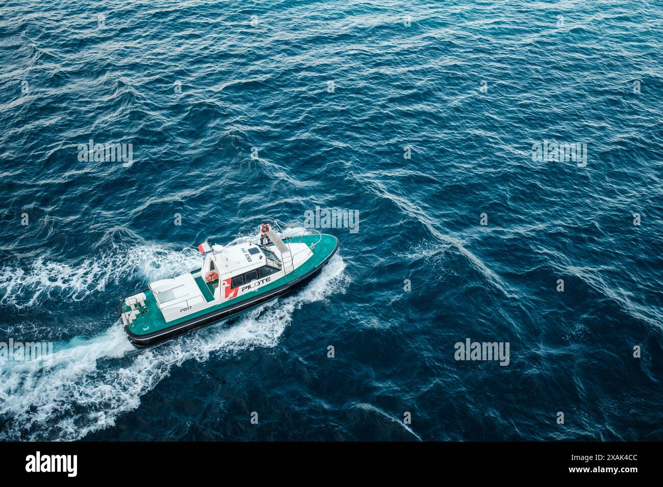 Marseille, France - 24th May 2024: Passengers on deck watch as a pilot ...