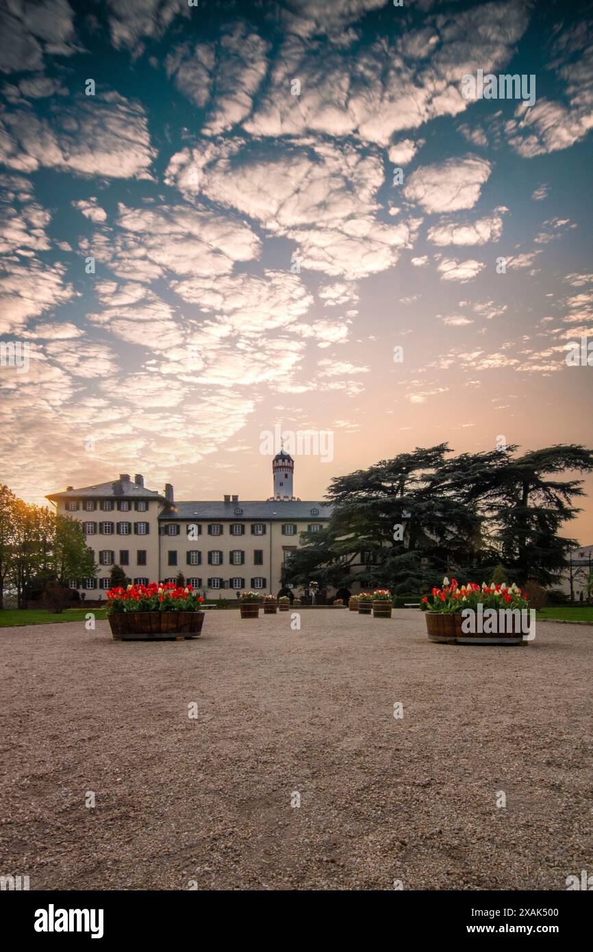 A castle with park at sunset. Historic building. Summer residence of ...