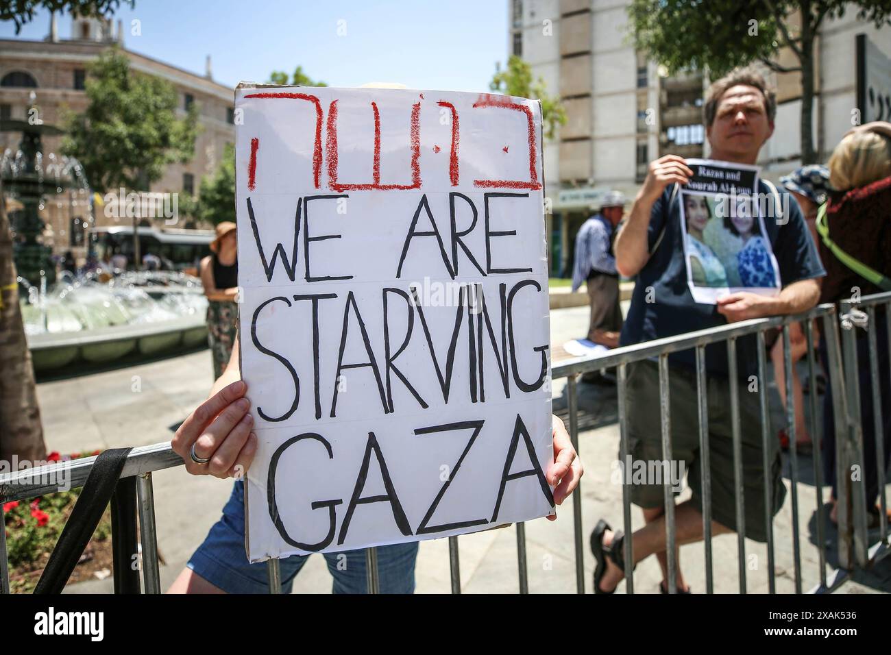 Jerusalem, Israel. 07th June, 2024. Protesters hold placards expressing ...