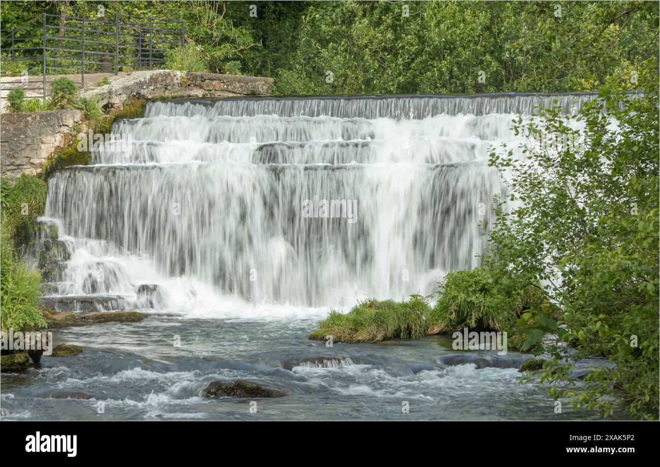 Cascades in flood and tumbling downwards on the river Wye Stock Photo ...