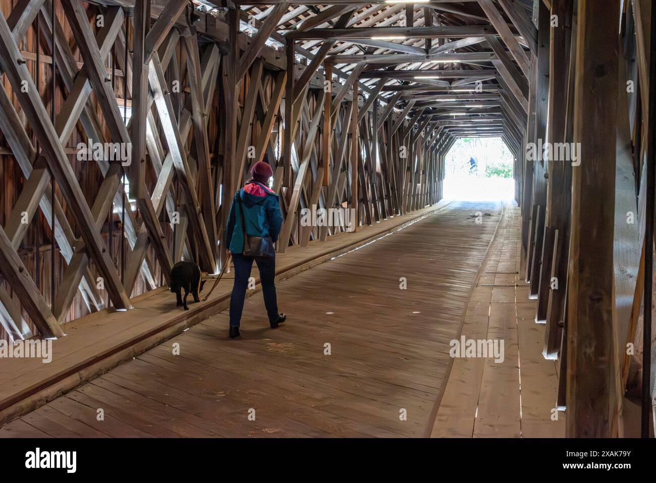 A tourist crossing the border from Liechtenstein to Switzerland at the ...