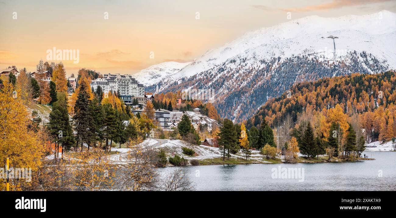 St. Moritz and lake in autumn, surrounded by snowcapped mountains ...