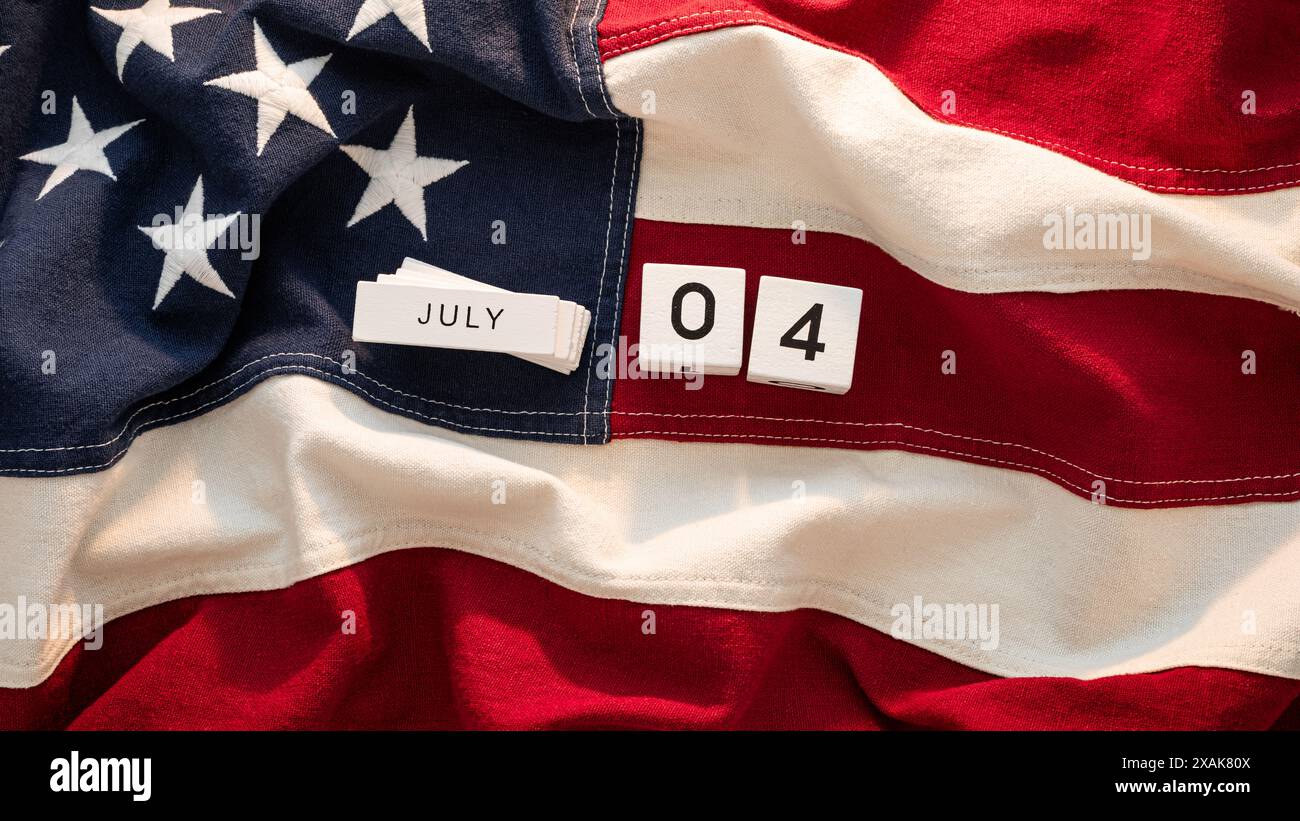 American Flag With July 4th Date Blocks Stock Photo - Alamy