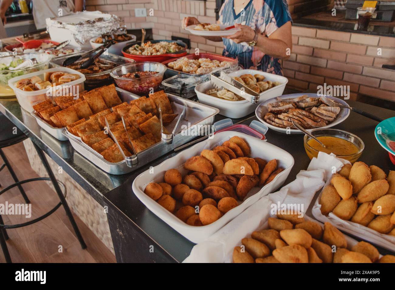 buffet table full of varied dishes Stock Photo - Alamy