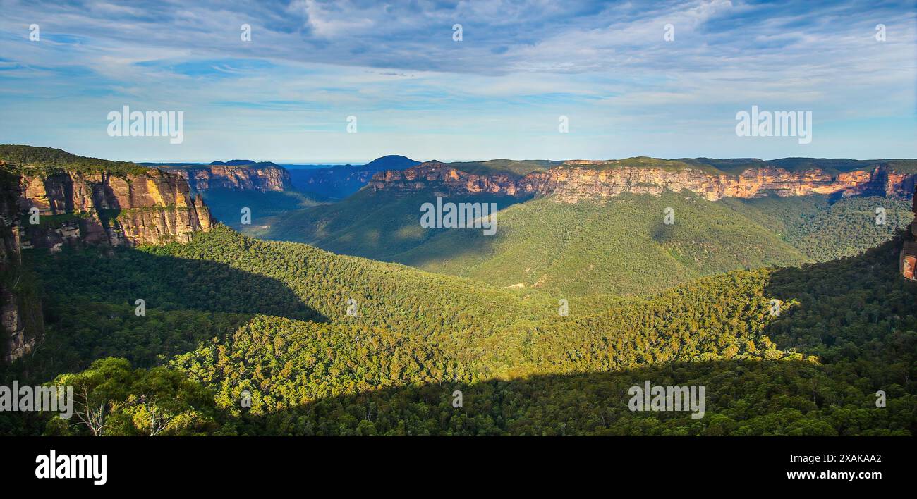 View over the cliffs and lush valleys of the Blue Mountains National ...