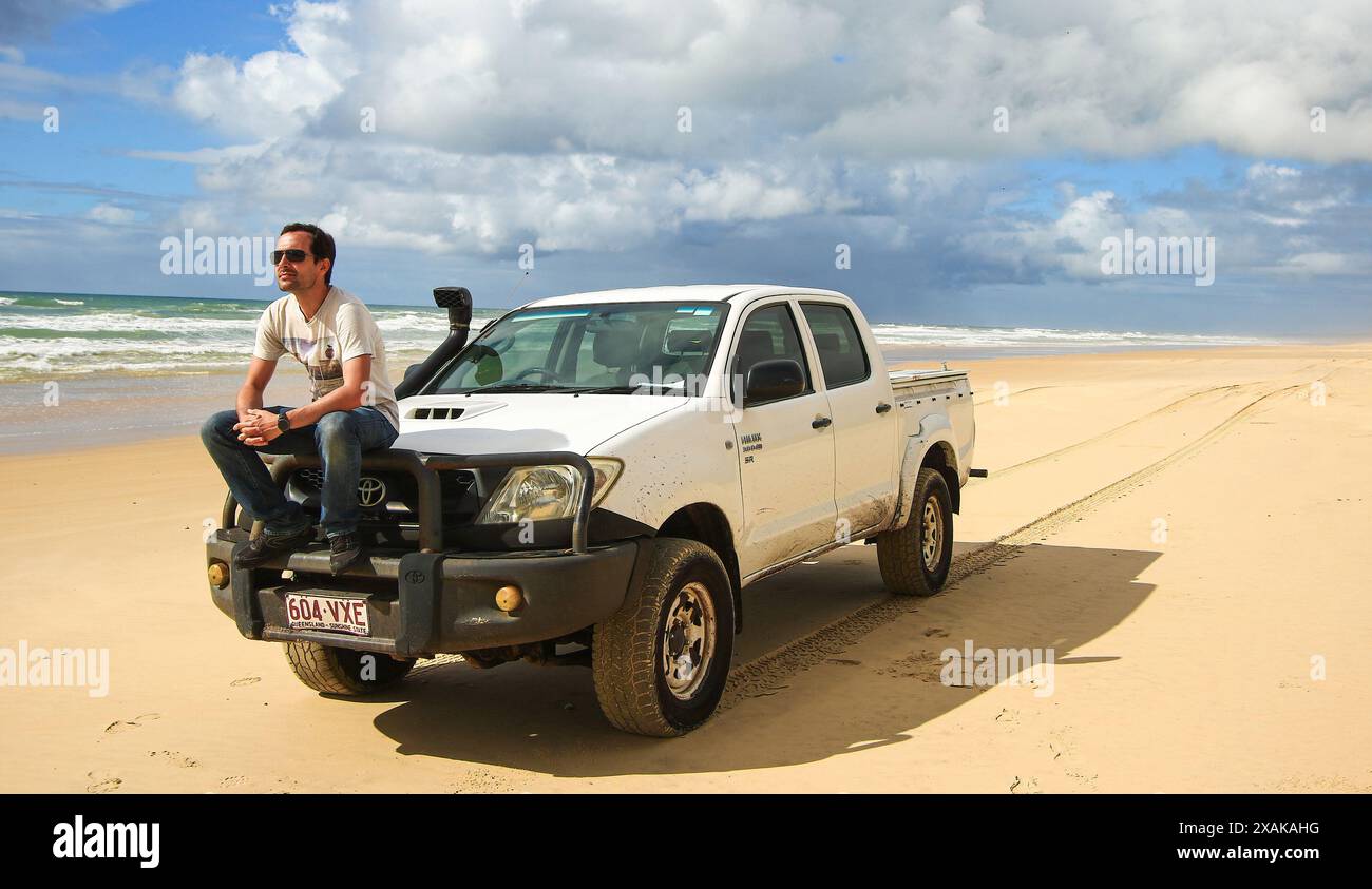 4-wheel drive pickup on the sandy highway of the 75-mile beach on the ...
