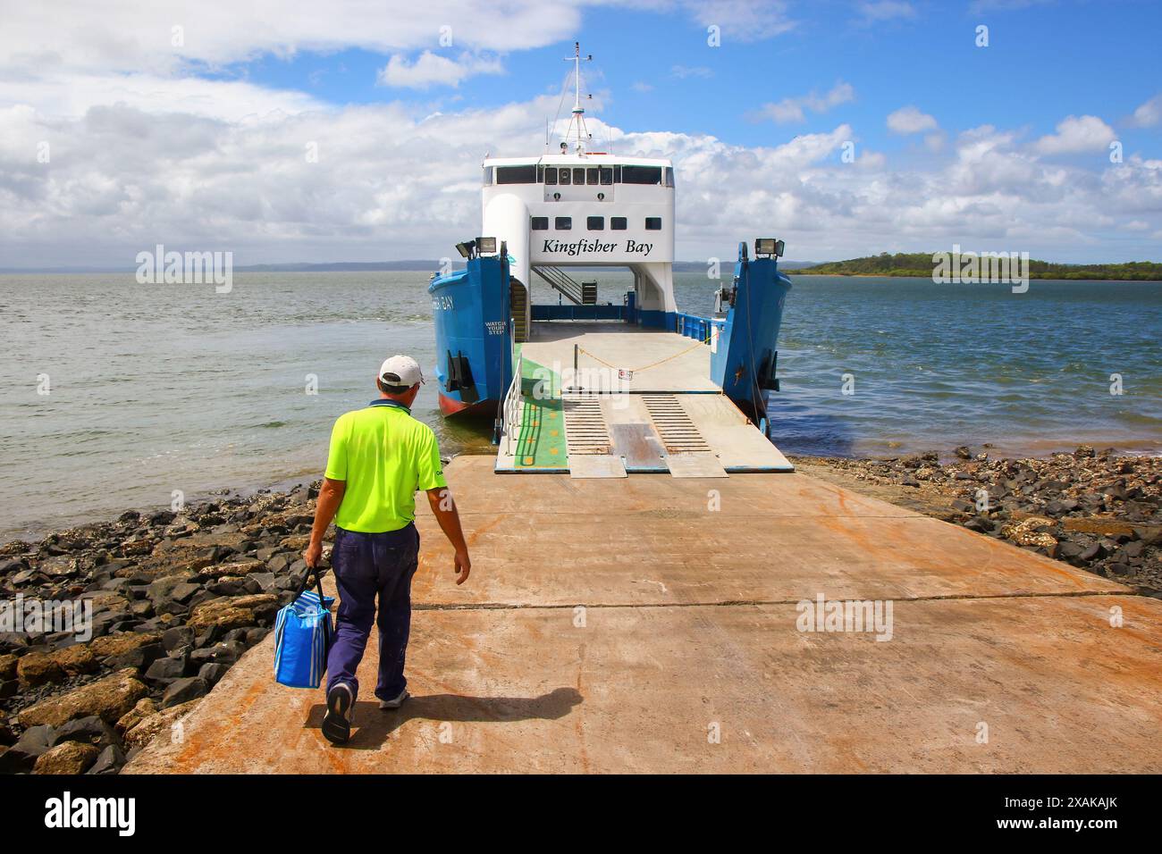 Passenger embarking on the Kingfisher Bay Ferry to Fraser Island in ...