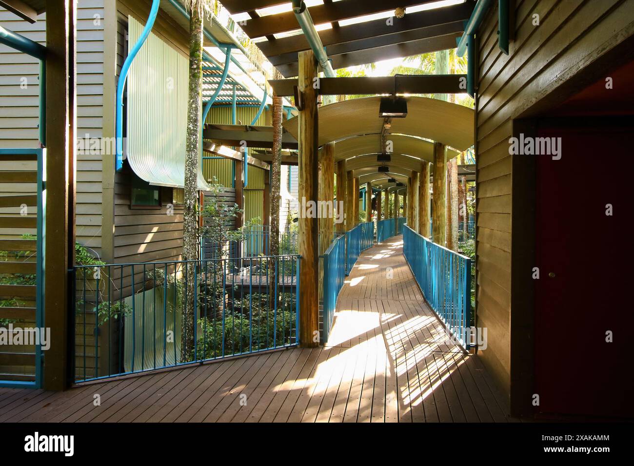 Outdoor elevated walkway of the Kingfisher Bay Resort leading to guest ...