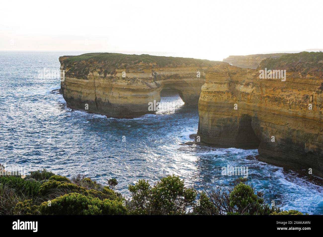 Offshore natural arch of Mutton Bird Island seen from the Loch Ard ...