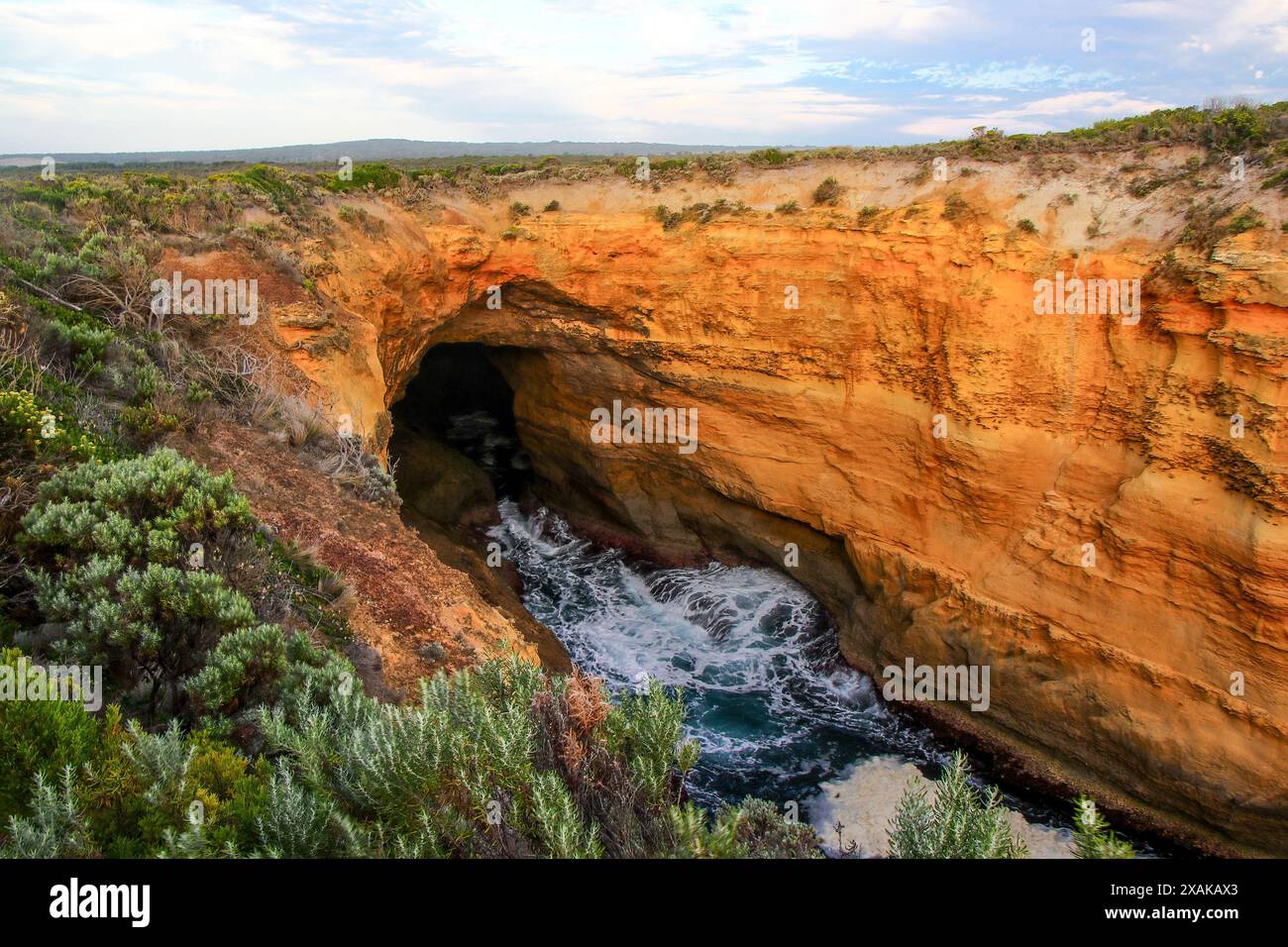 Thunder Cave in a flooded gorge on the coast of the Tasman Sea in the ...