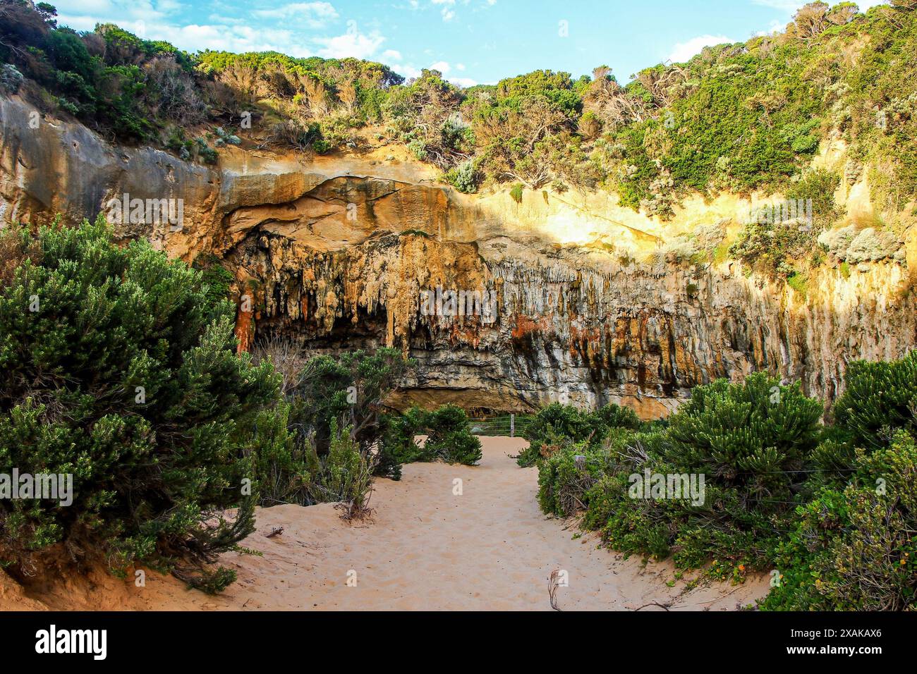 Limestone cave on the rock face of the Loch Ard Gorge in the Twelve ...