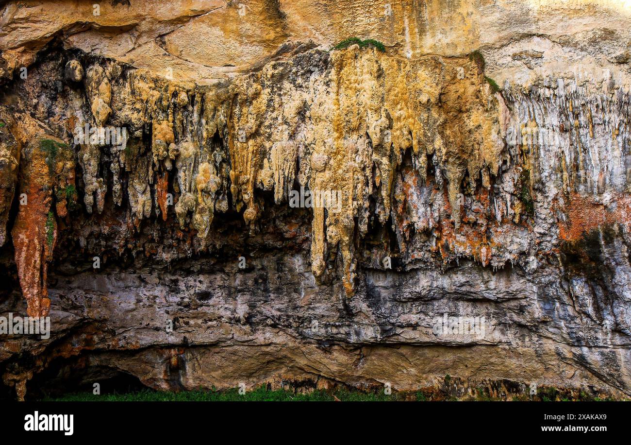 Limestone cave on the rock face of the Loch Ard Gorge in the Twelve ...