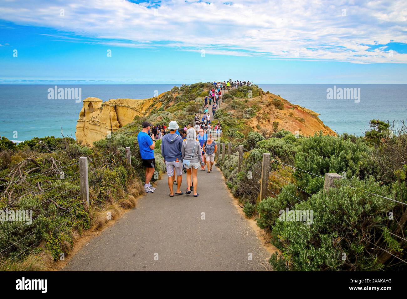 Crowd of tourists walking on a ridge on top of Castle Rock at the ...