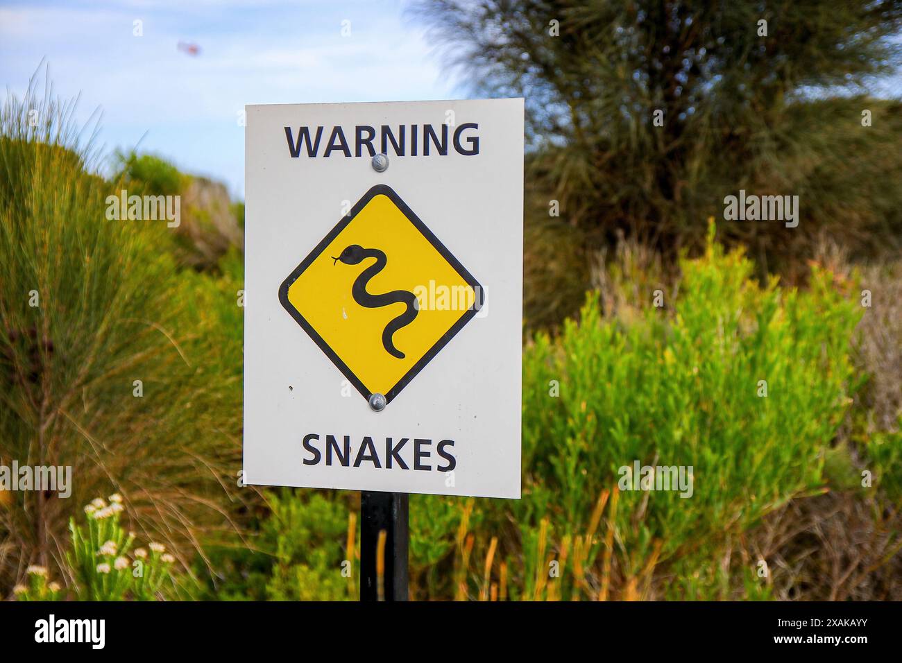 Signpost warning of the presence of snakes on The Twelve Apostles trail ...