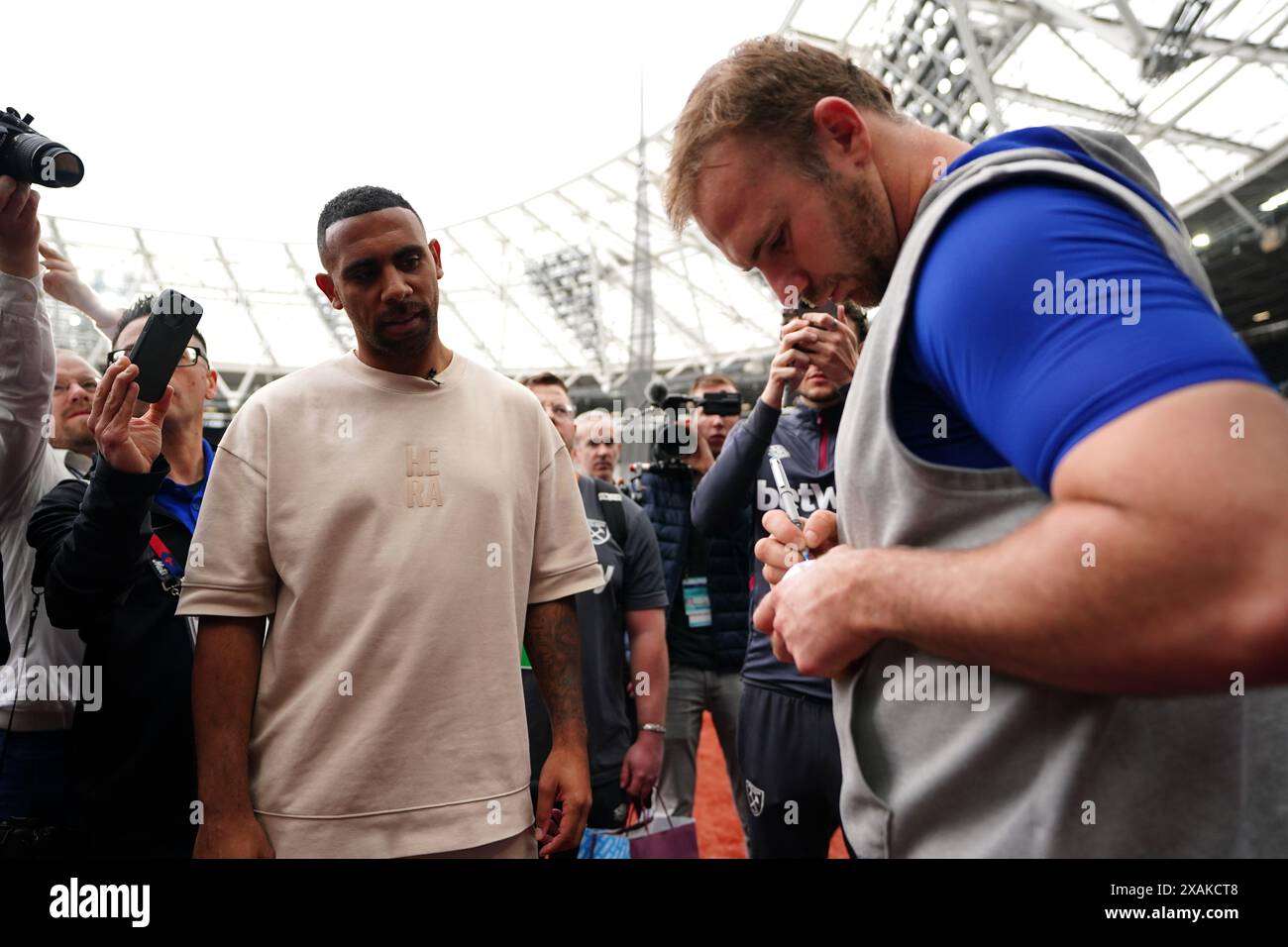 Former West Ham United player Anton Ferdinand (left) with New York Mets ...