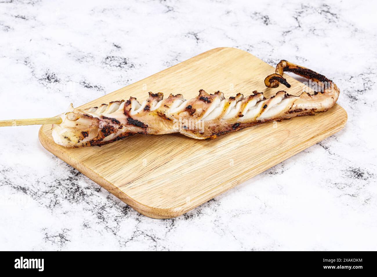 Delicous tasty Grilled octopus tentacle snack Stock Photo - Alamy