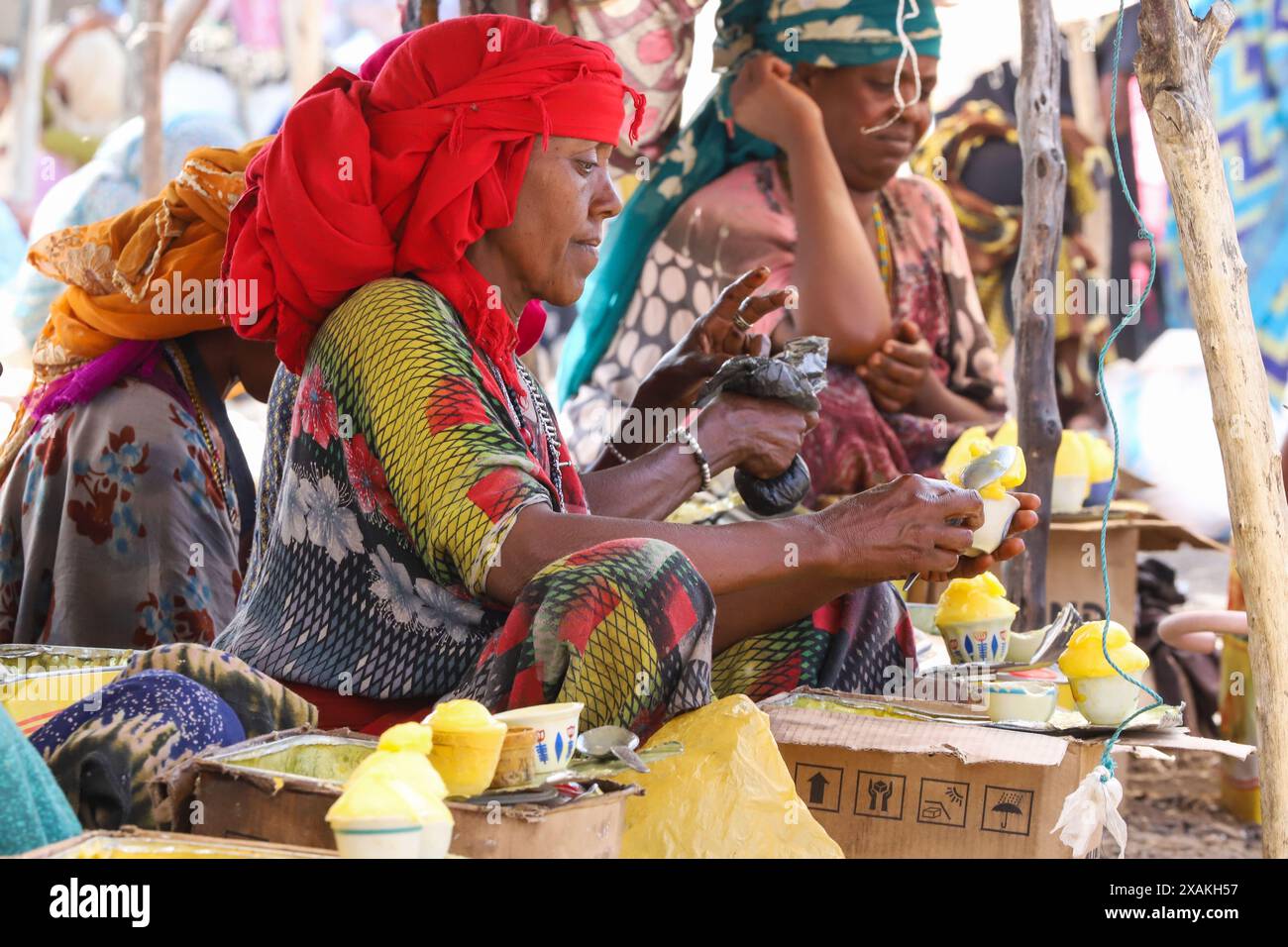 Addis Ababa. 27th May, 2024. A vendor looks after her business at a ...