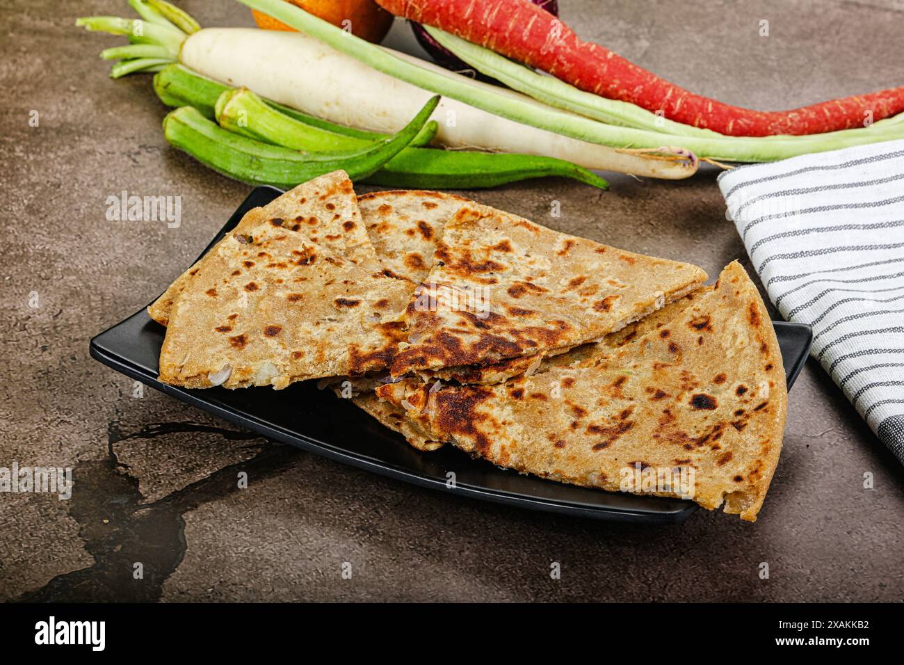 Indian vegetarian Aloo Paratha - bread with potato Stock Photo - Alamy