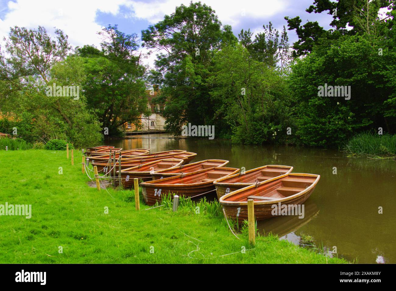 Rowing boats tethered on the river Stour at Flatford Mill, East ...