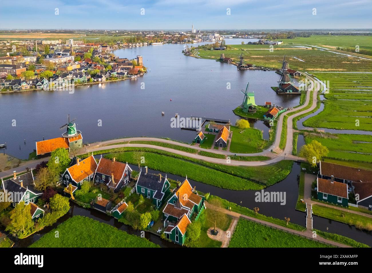 Aerial view of the typical windmills of Zaanse Schans on the river Zaan ...