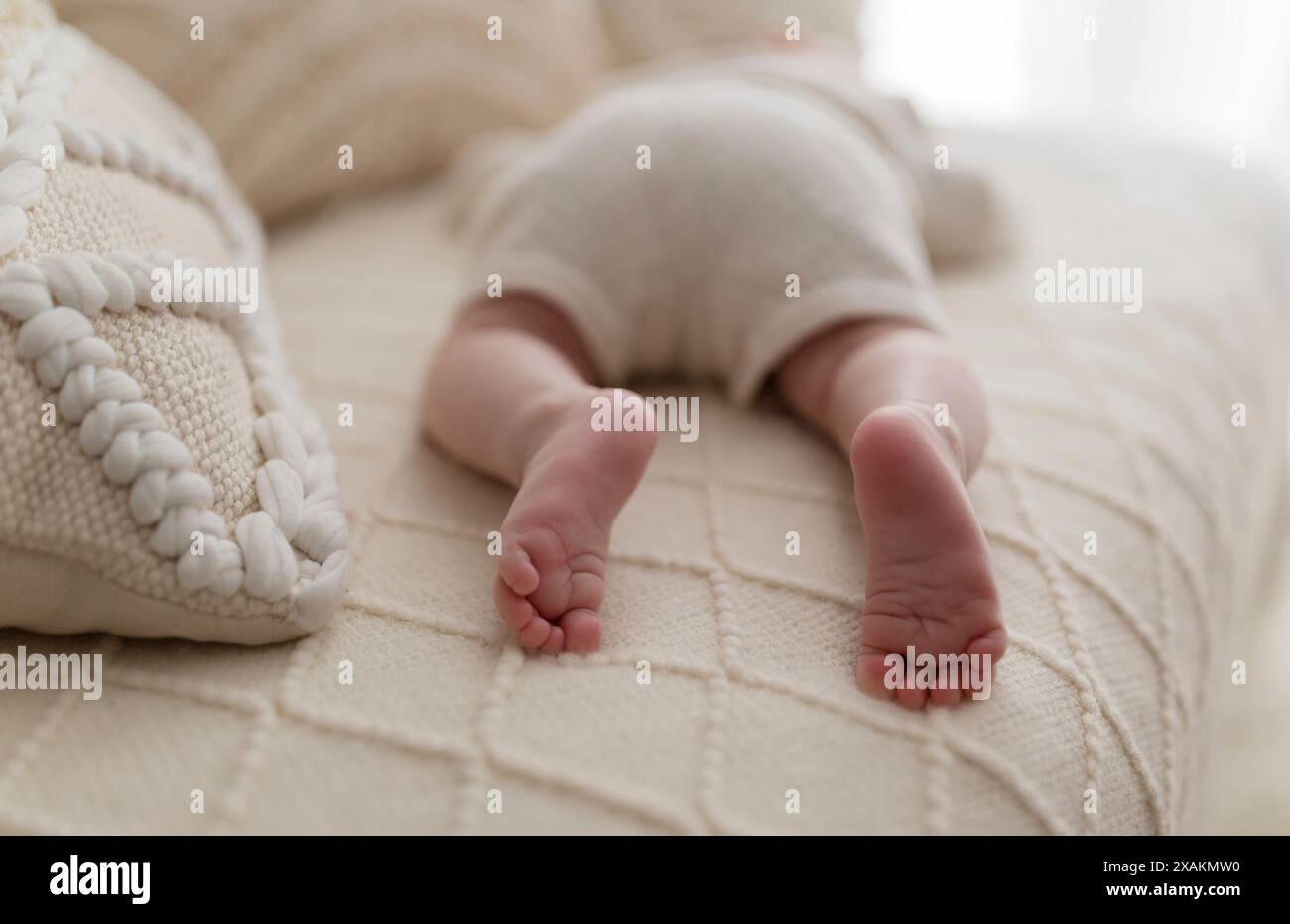 Baby lay down hi-res stock photography and images - Alamy
