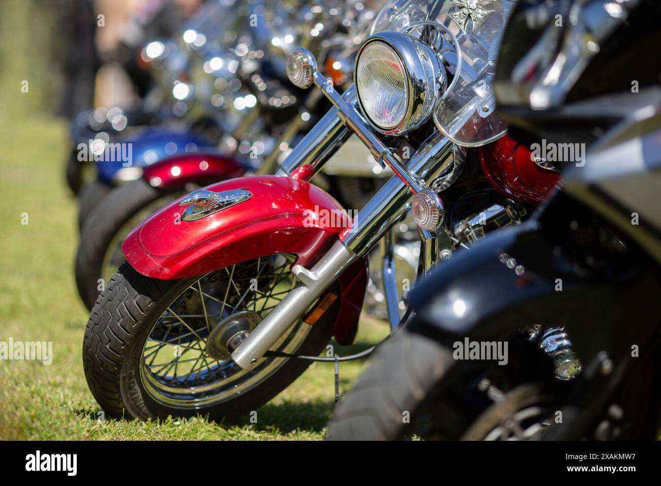Motorcycles parked in a row Stock Photo - Alamy