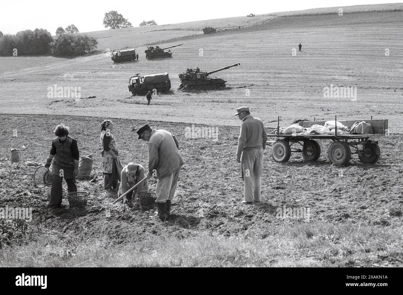 Tanks (155mm howitzers) practicing on a potato field, autumn maneuvers ...