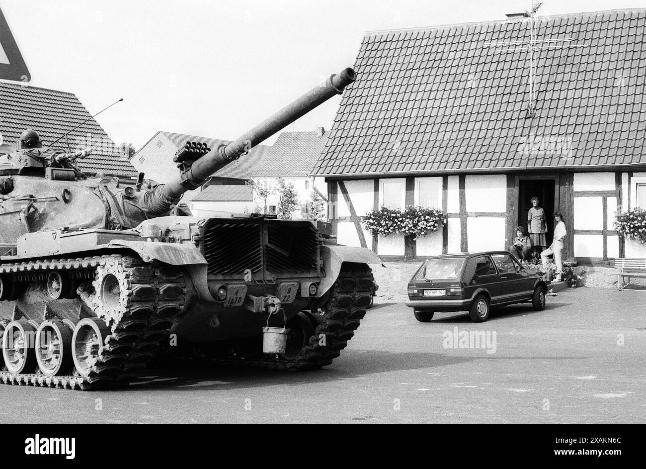 US tank takes up position in front of half-timbered house, the family ...