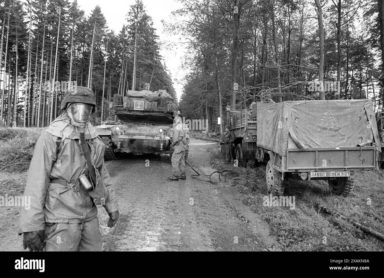 A prepared decontamination station, tanker, US soldiers spraying tanks ...
