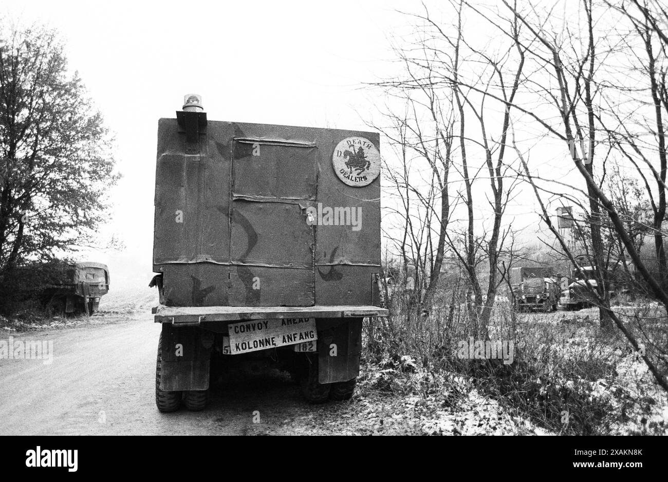 A US Army motorcade bears the inscription 'DEATH DEALERS' with the ...