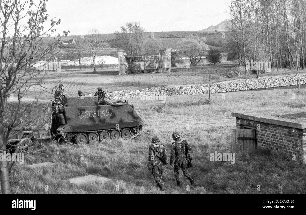 US soldiers patrol the border area, on foot and with armored ...