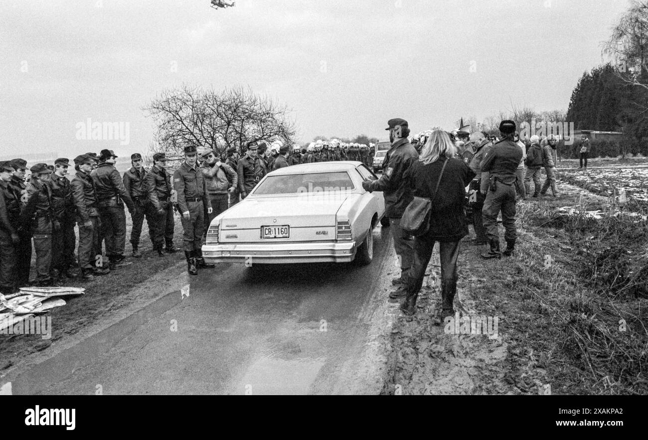 Peace activists block a US car from entering the Erlensee airbase ...