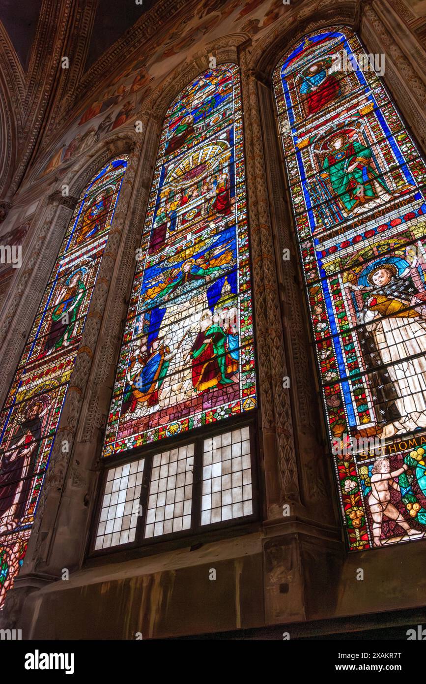 Colorful stained glass windows in the presbytery of basilica Santa ...