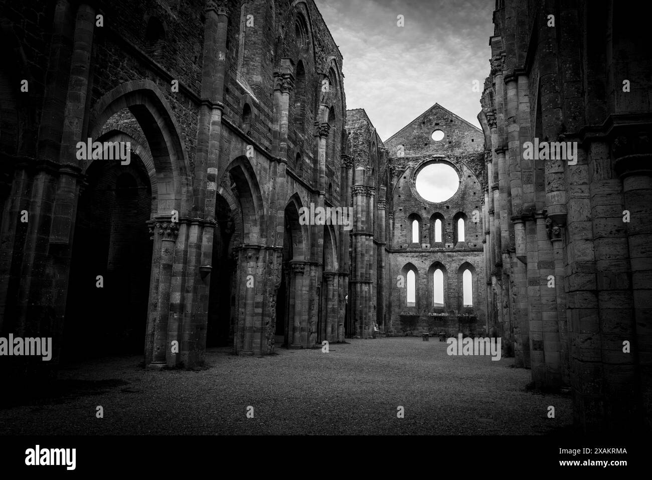 Nave of the ruined and abandoned Cistercian monastery San Galgano in ...