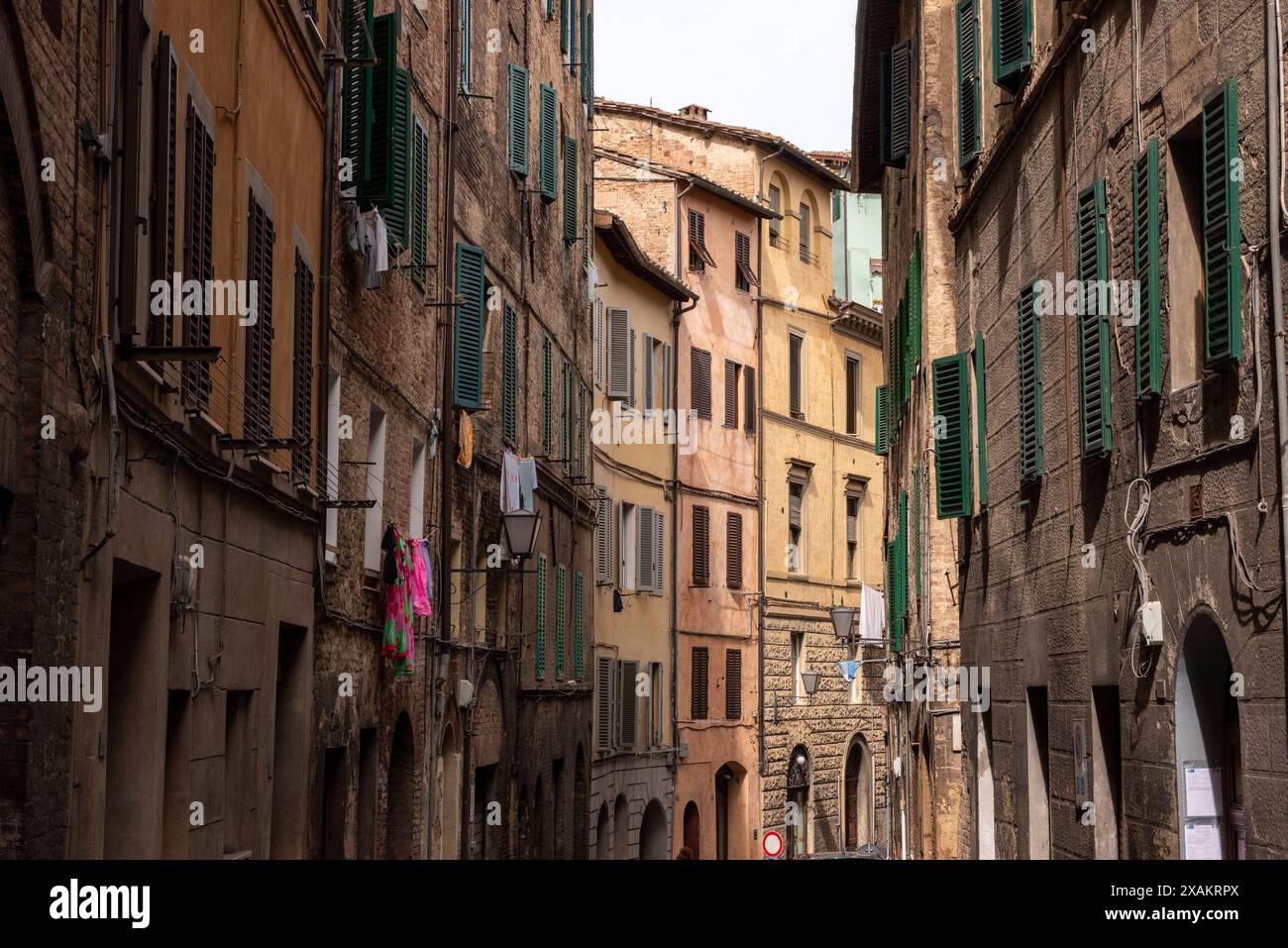 Somewhere in the streets of the old medieval Siena, Italy Stock Photo ...