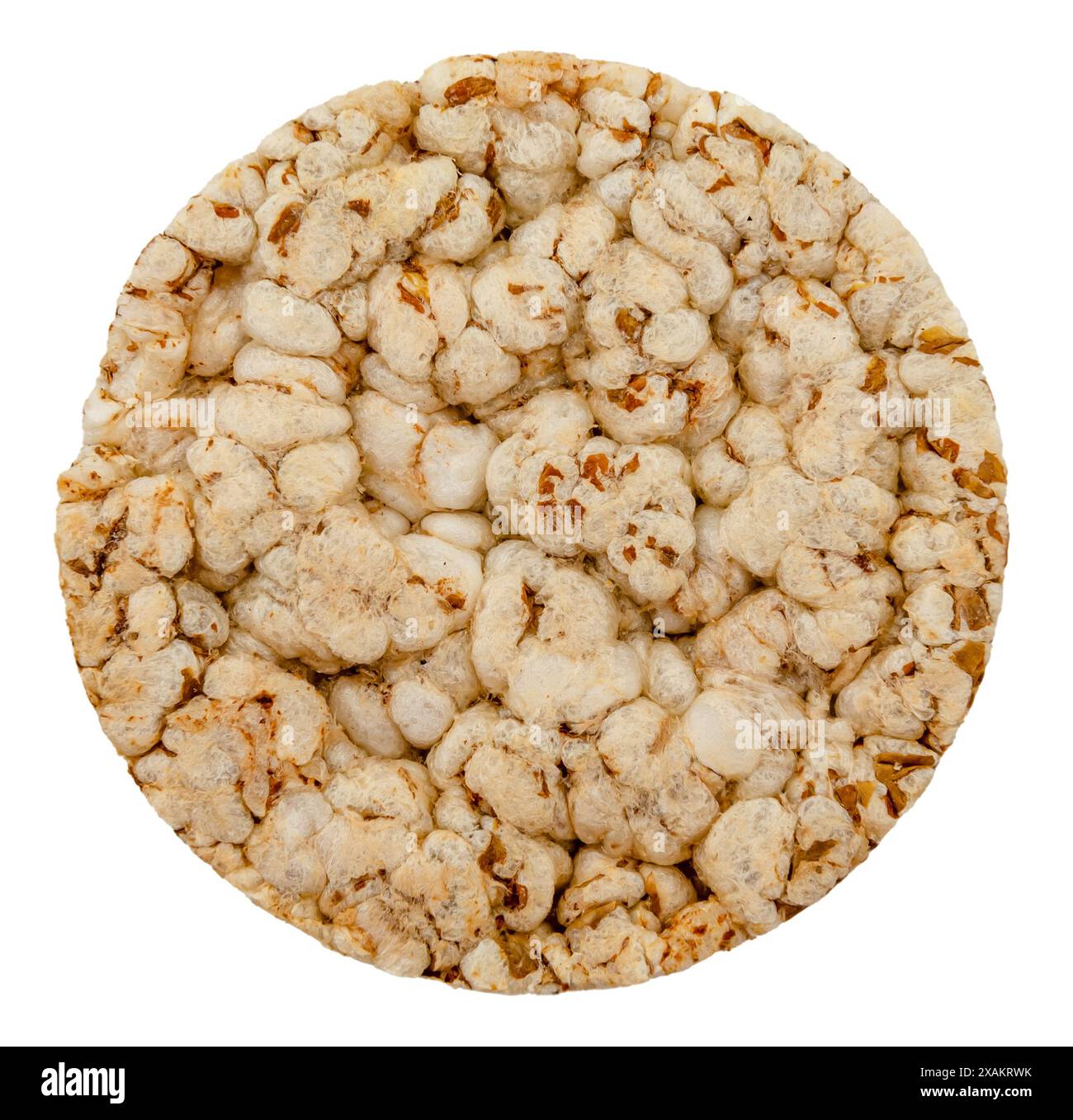 One round whole grain crispbread on a white background. View from above ...