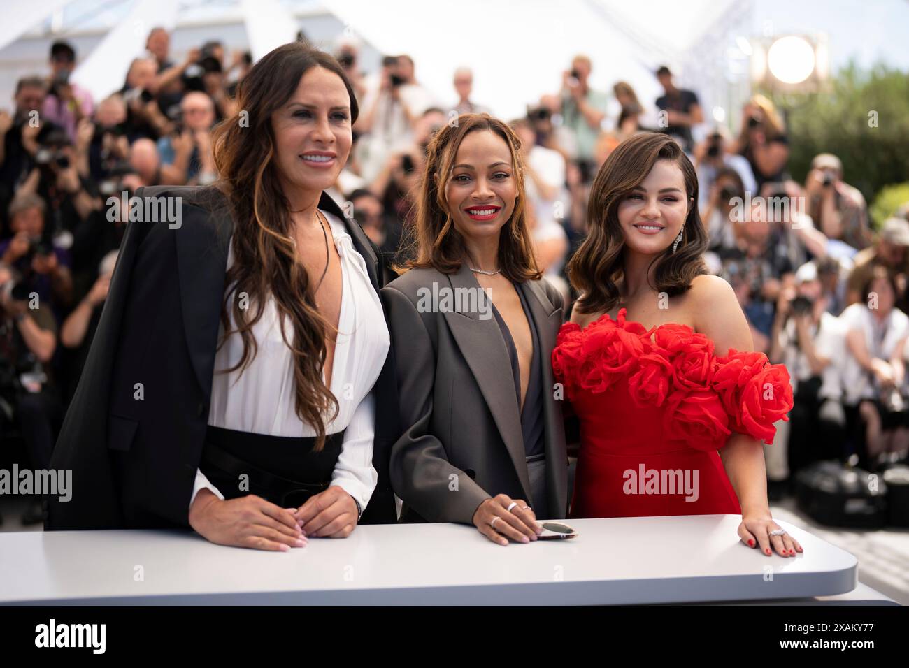 Karla Sofia Gascon, from left, Zoe Saldana and Selena Gomez pose for photographers at the photo ...