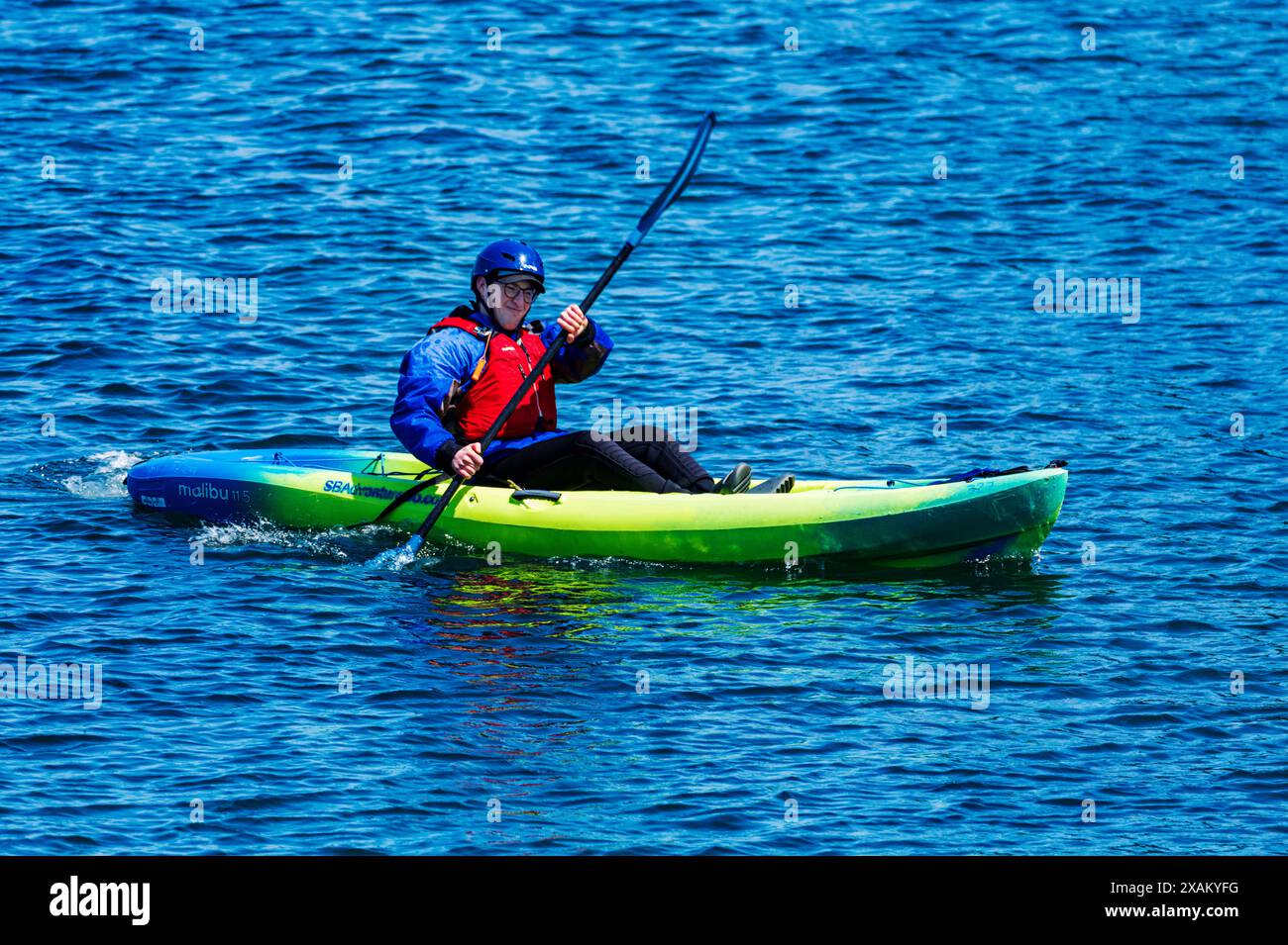 Kayakers off the coast of Santa Cruz Island; Channel Islands National ...