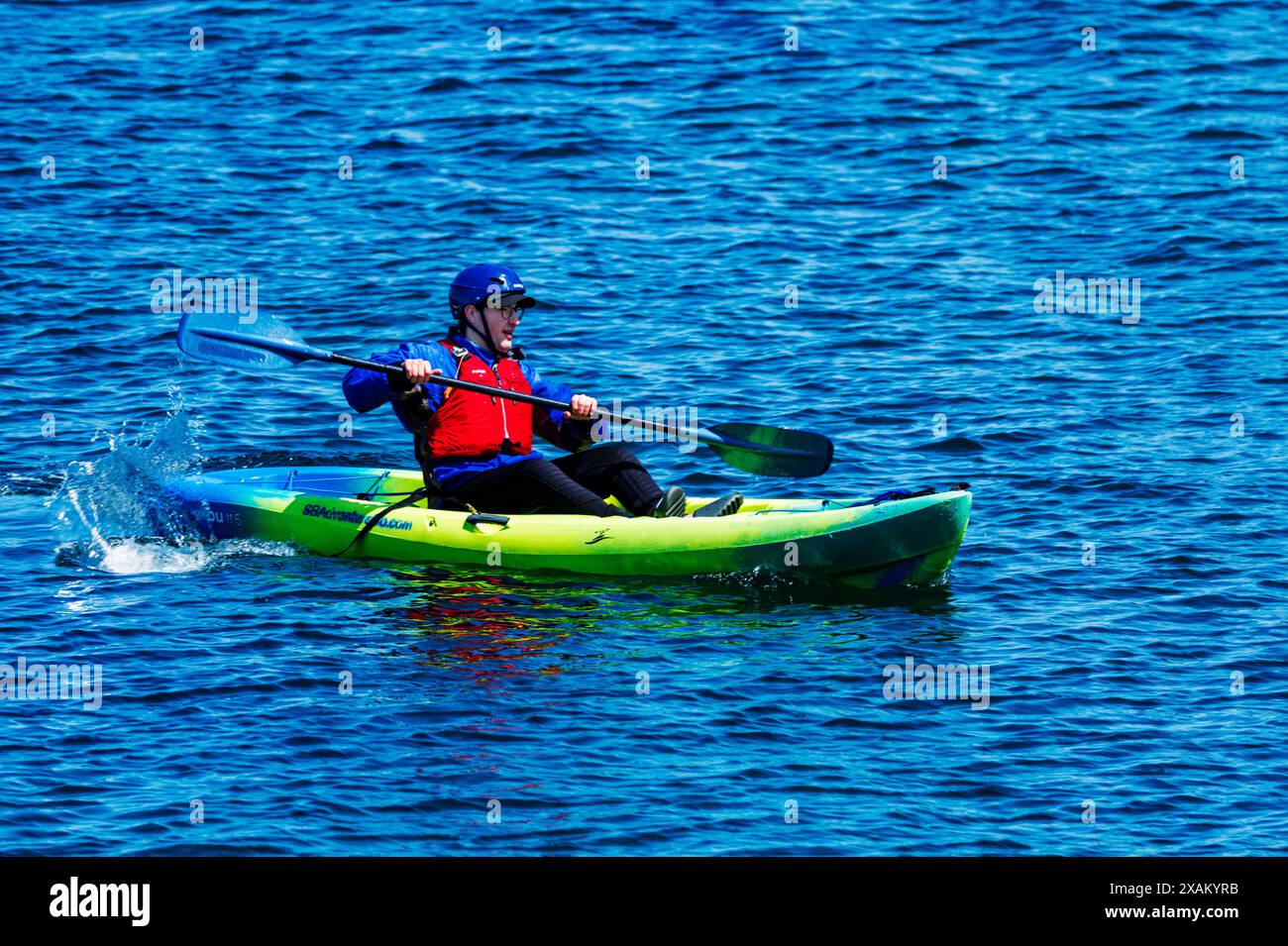 Kayakers off the coast of Santa Cruz Island; Channel Islands National ...