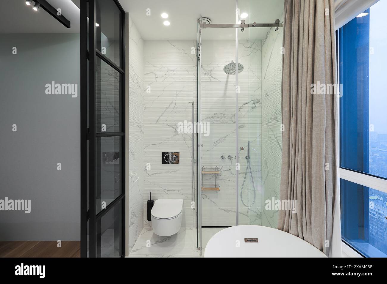Modern bathroom interior with shower cabin, bathtub and white toilet ...