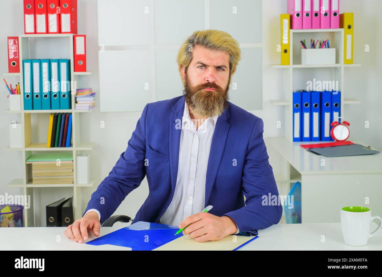 Male office worker writing on hi-res stock photography and images - Alamy