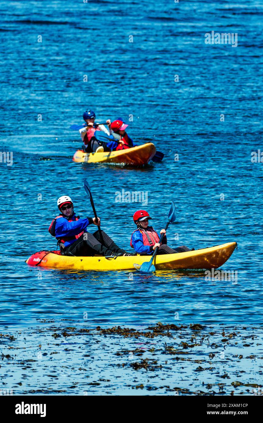 Kayakers off the coast of Santa Cruz Island; Channel Islands National ...