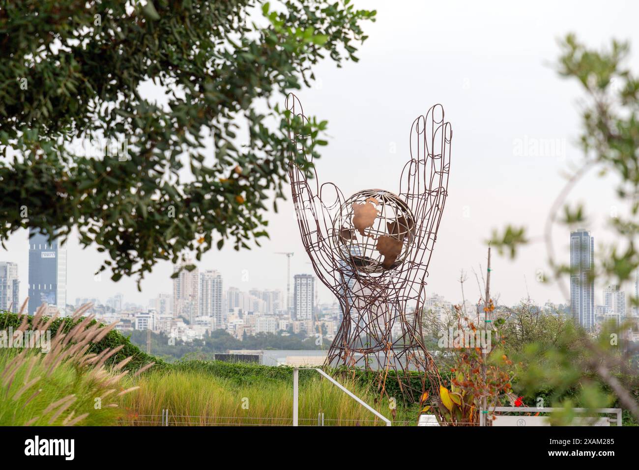 Tel Aviv, Israel - October 27, 2023 - Metal wire statue of two hands ...