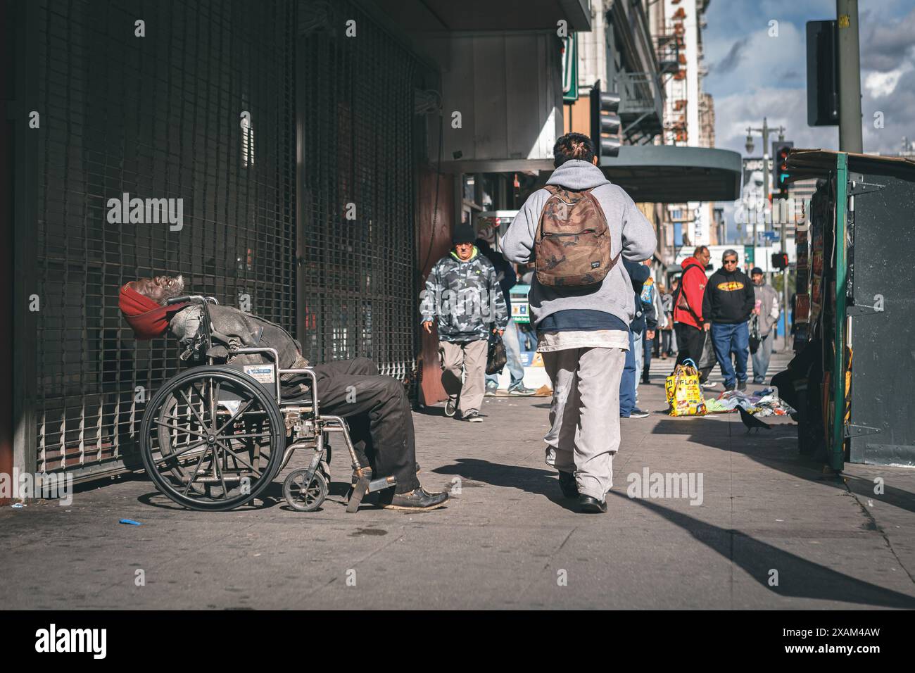 Impoverished homeless in a wheelchair on the streets of Los Angeles ...