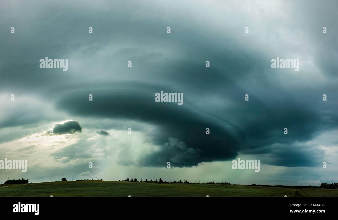 Supercell storm clouds with intense tropic rain. Lithuania Stock Photo ...