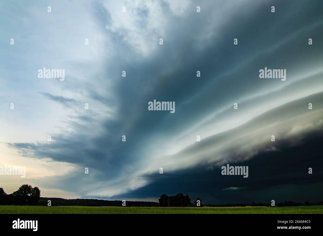 Supercell storm clouds with intense tropic rain. Lithuania Stock Photo ...