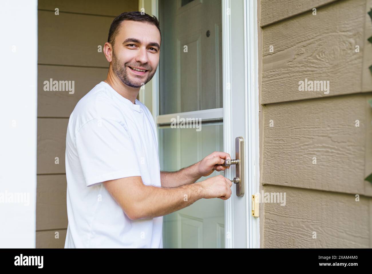 Key opening front door hi-res stock photography and images - Alamy