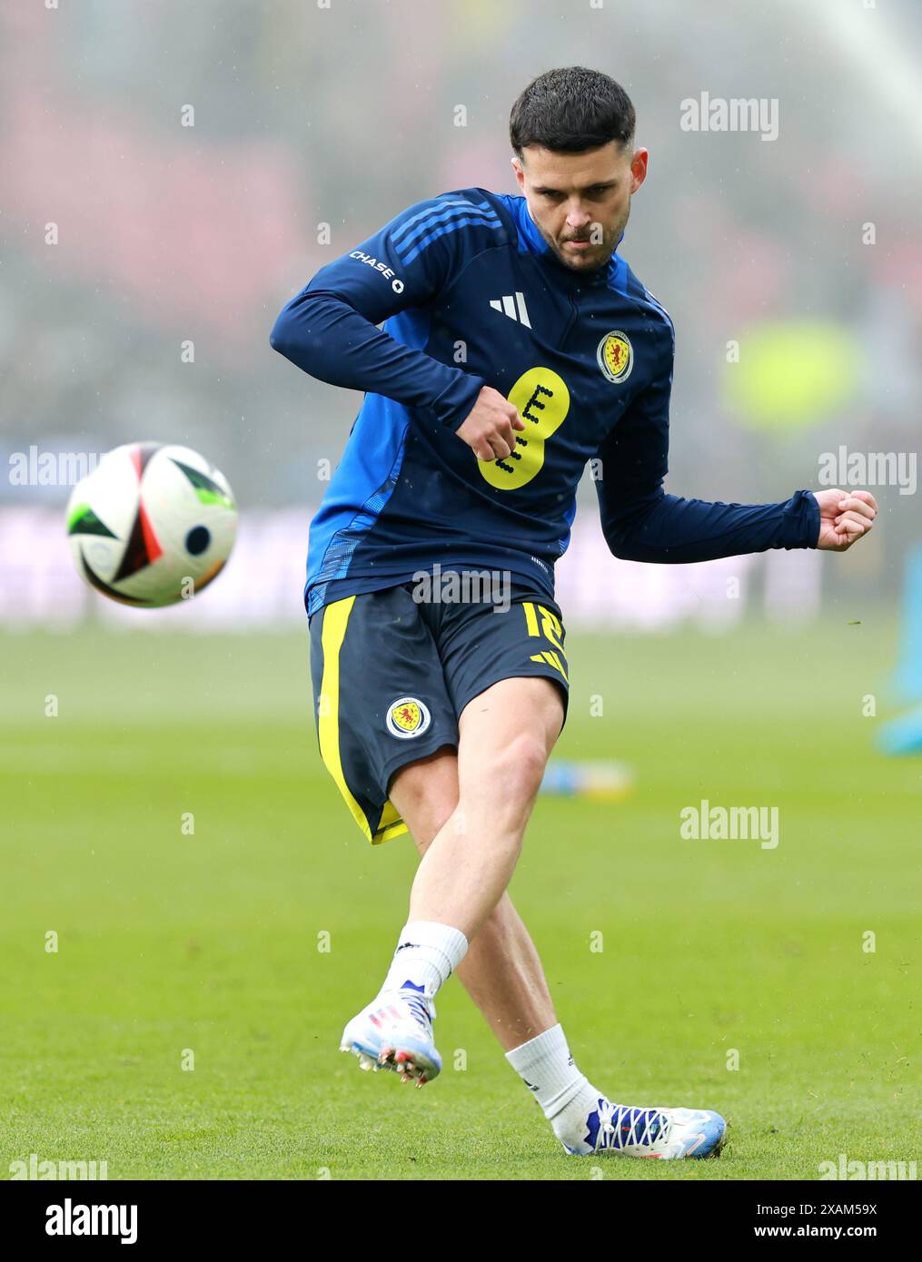 Scotland's Lewis Morgan warming up prior to kick-off before an ...