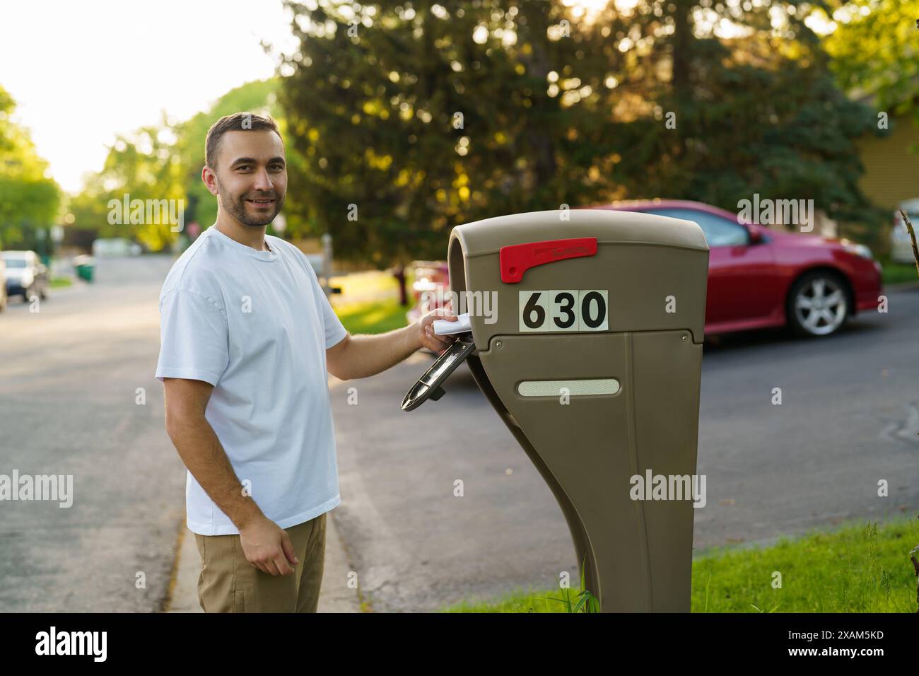 Getting mail from a mailbox hi-res stock photography and images - Alamy