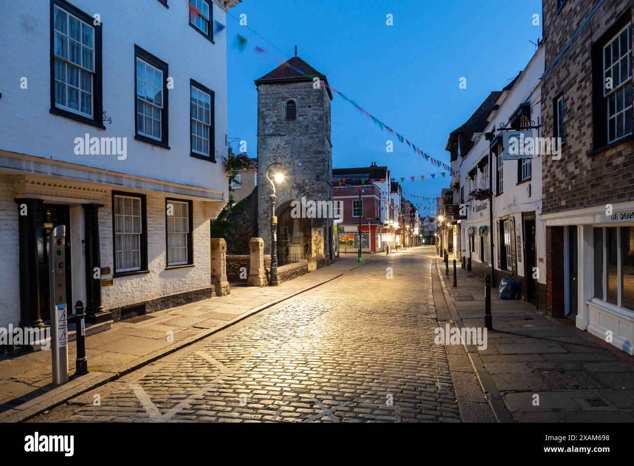 Dawn on the cobbled street of Burgate in Canterbury city centre, Kent ...